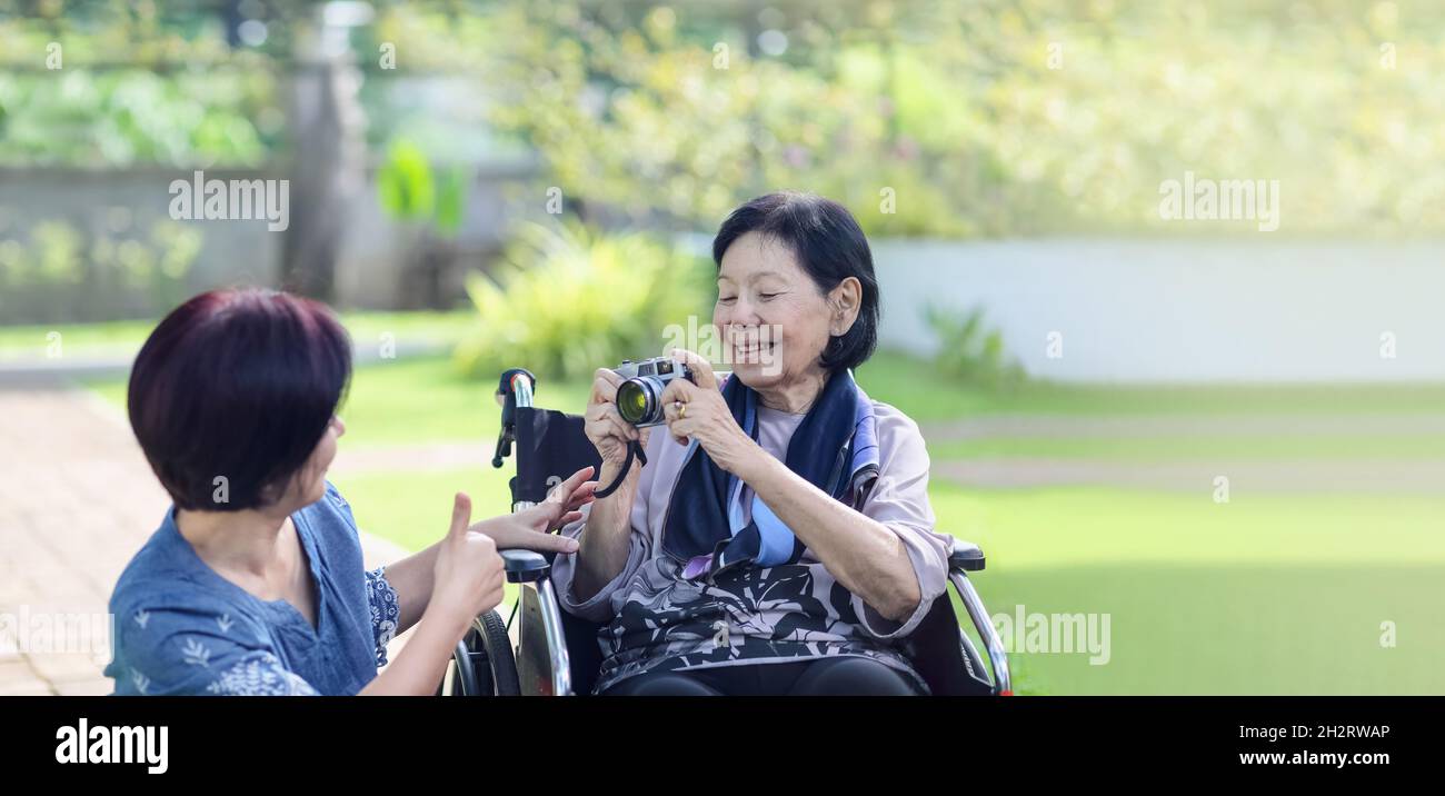Looking after elderly parent hi-res stock photography and images - Alamy