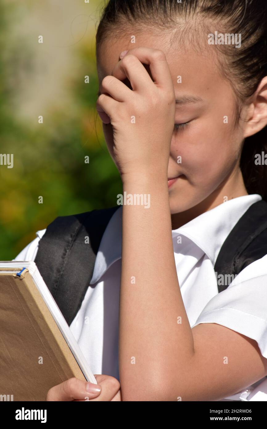 Youthful Filipina Girl Student And Depression Stock Photo - Alamy