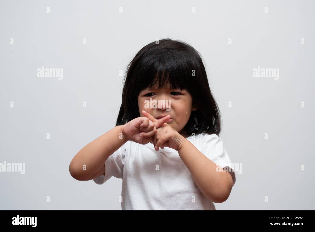 Portrait of Asian angry, sad and cry little girl on white isolated ...