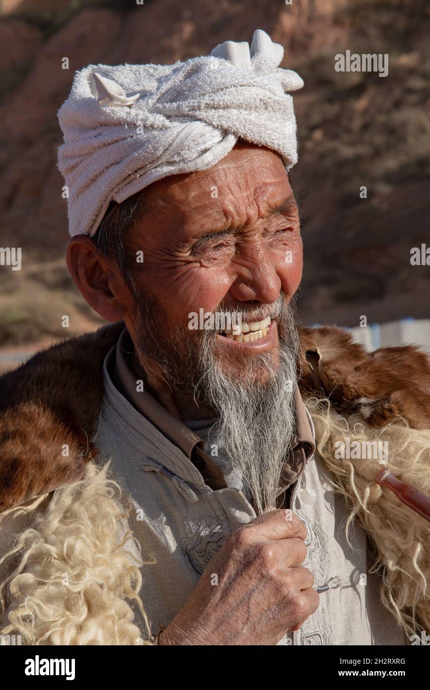Elder Chinese man with turban at Jingbian, China Stock Photo - Alamy