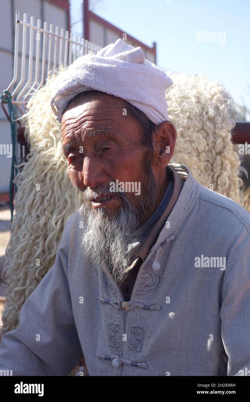 Elder Chinese man with turban at Jingbian, China Stock Photo - Alamy