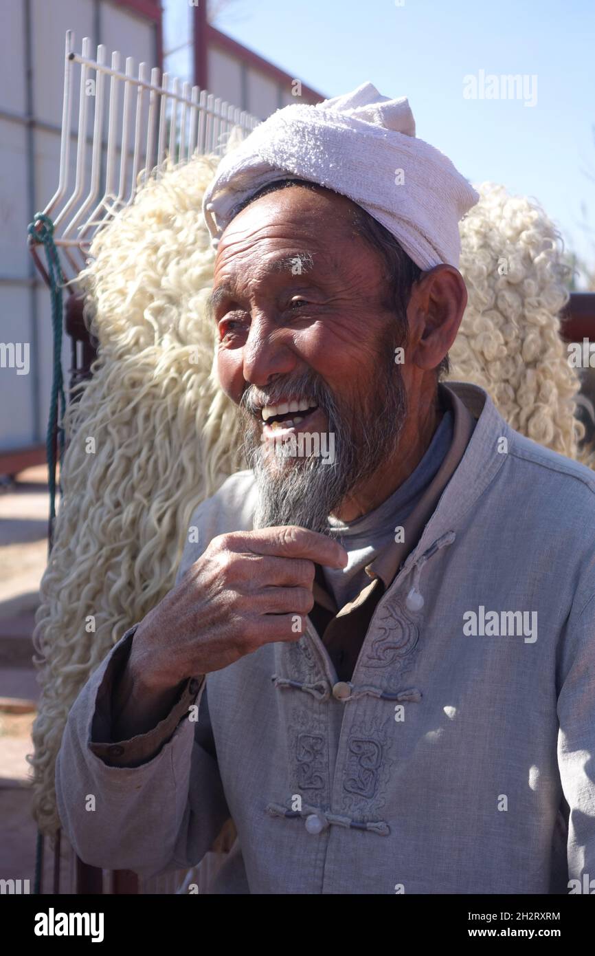 Elder Chinese man with turban at Jingbian, China Stock Photo - Alamy