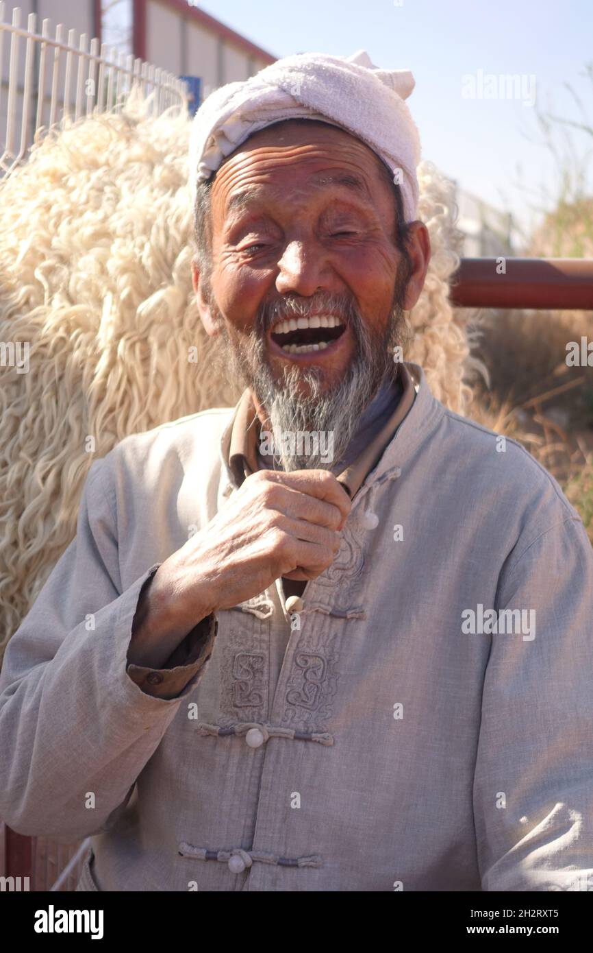 Elder Chinese man with turban at Jingbian, China Stock Photo - Alamy