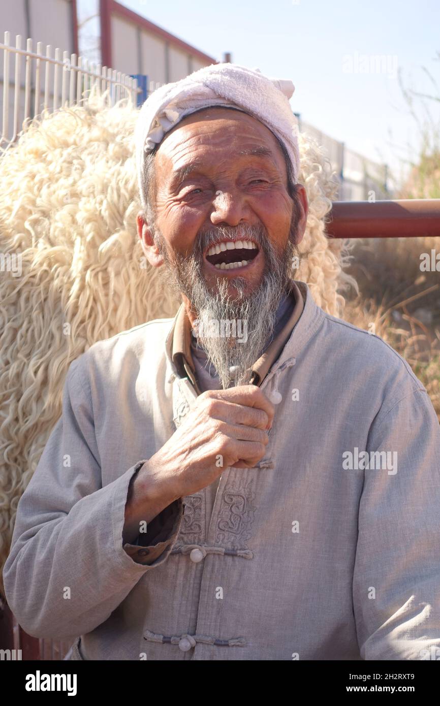 Elder Chinese man with turban at Jingbian, China Stock Photo - Alamy