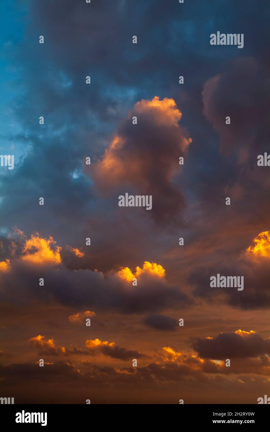 Colorful sunset sky with dramatic orange clouds. Only sky, no land ...
