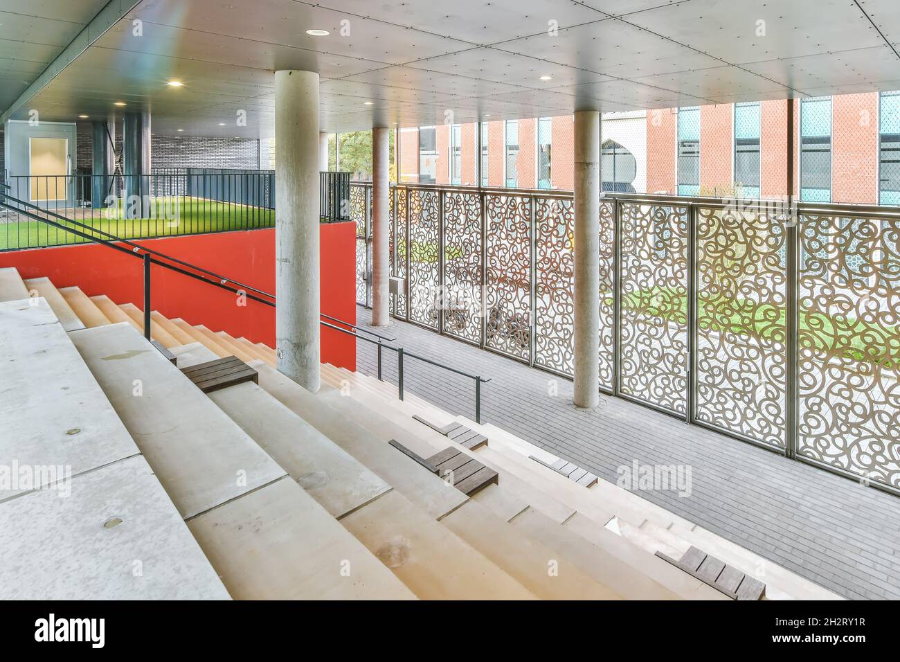 Stylish staircase inside the building with seats Stock Photo - Alamy