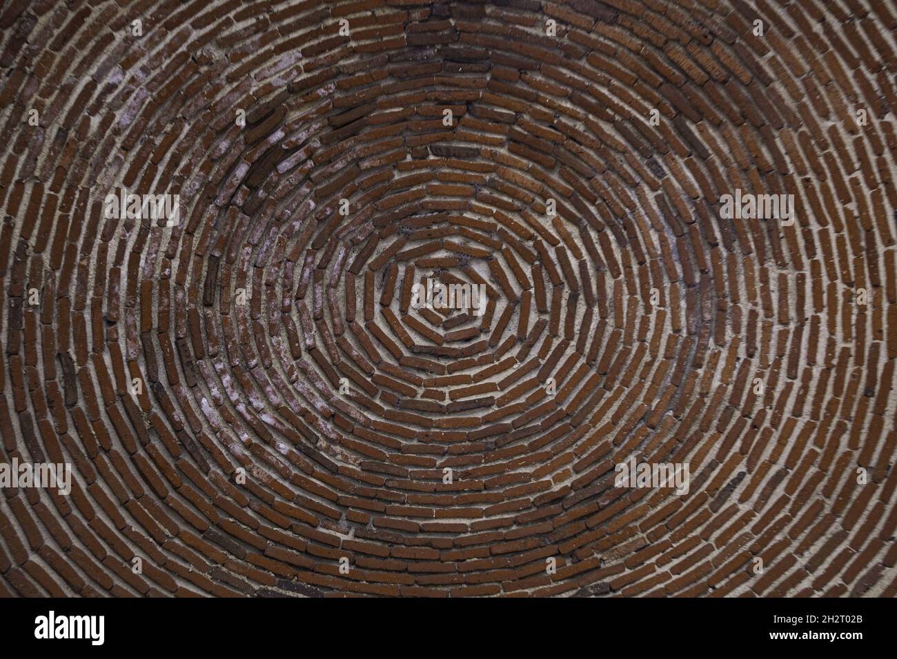 A cobblestone pavement floor with a circle shape pattern Stock Photo ...