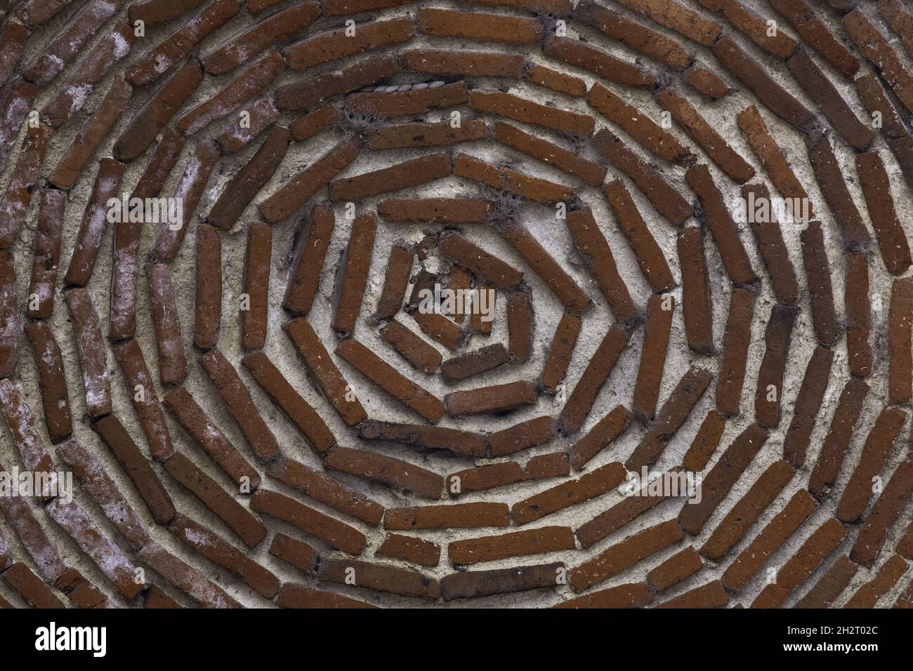 A cobblestone pavement floor with a circle shape pattern Stock Photo ...