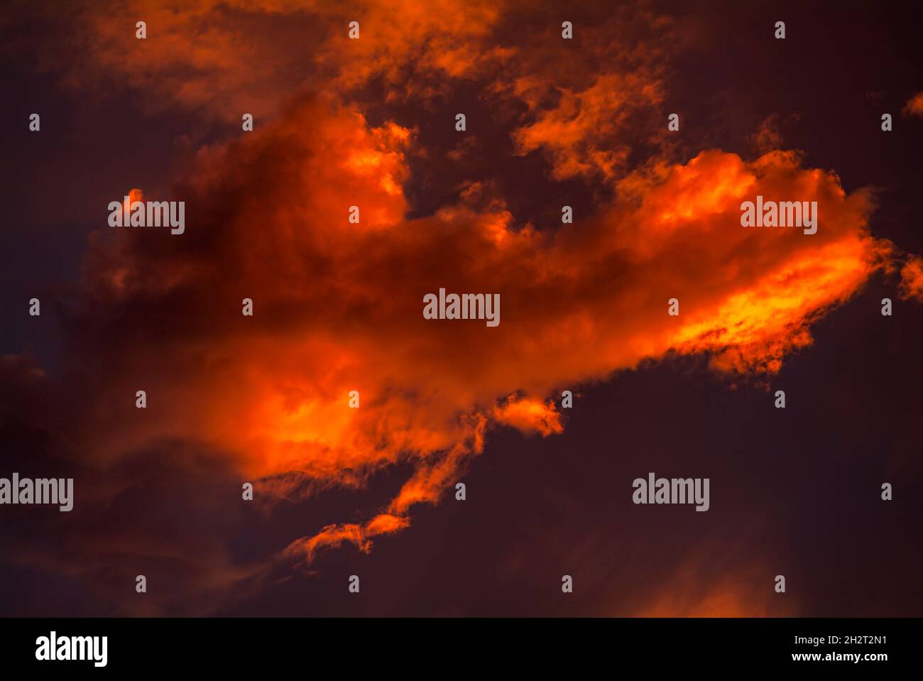Colorful sunset sky with dramatic orange clouds. Only sky, no land ...