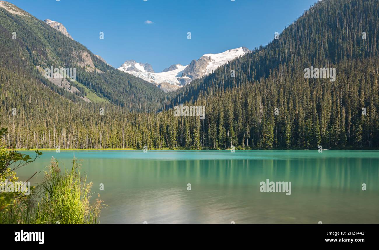 Beautiful landscape with turquoise lake, forest and mountains. Mountain ...