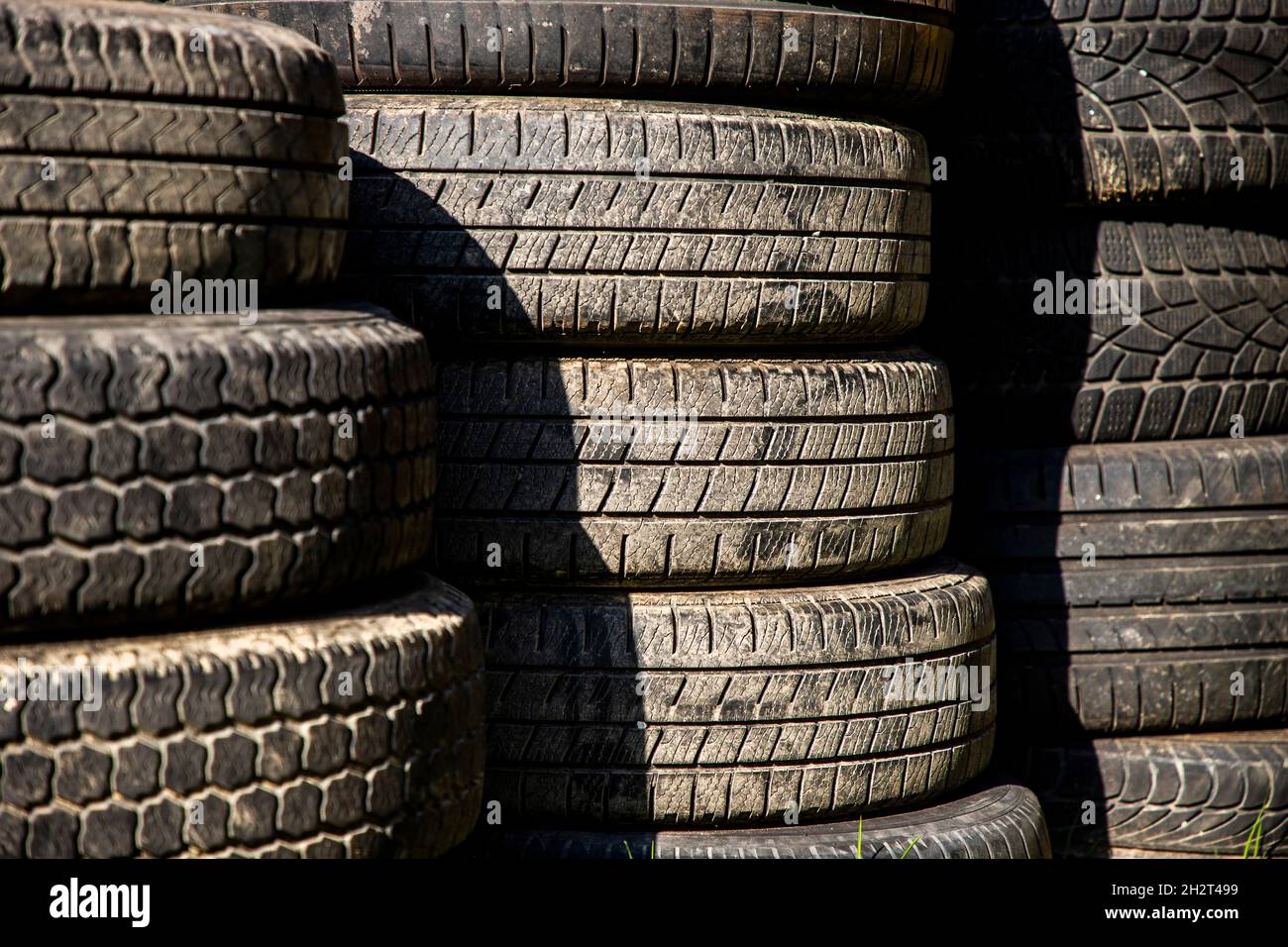 Pile of old steal rims thrown away into nature Stock Photo - Alamy