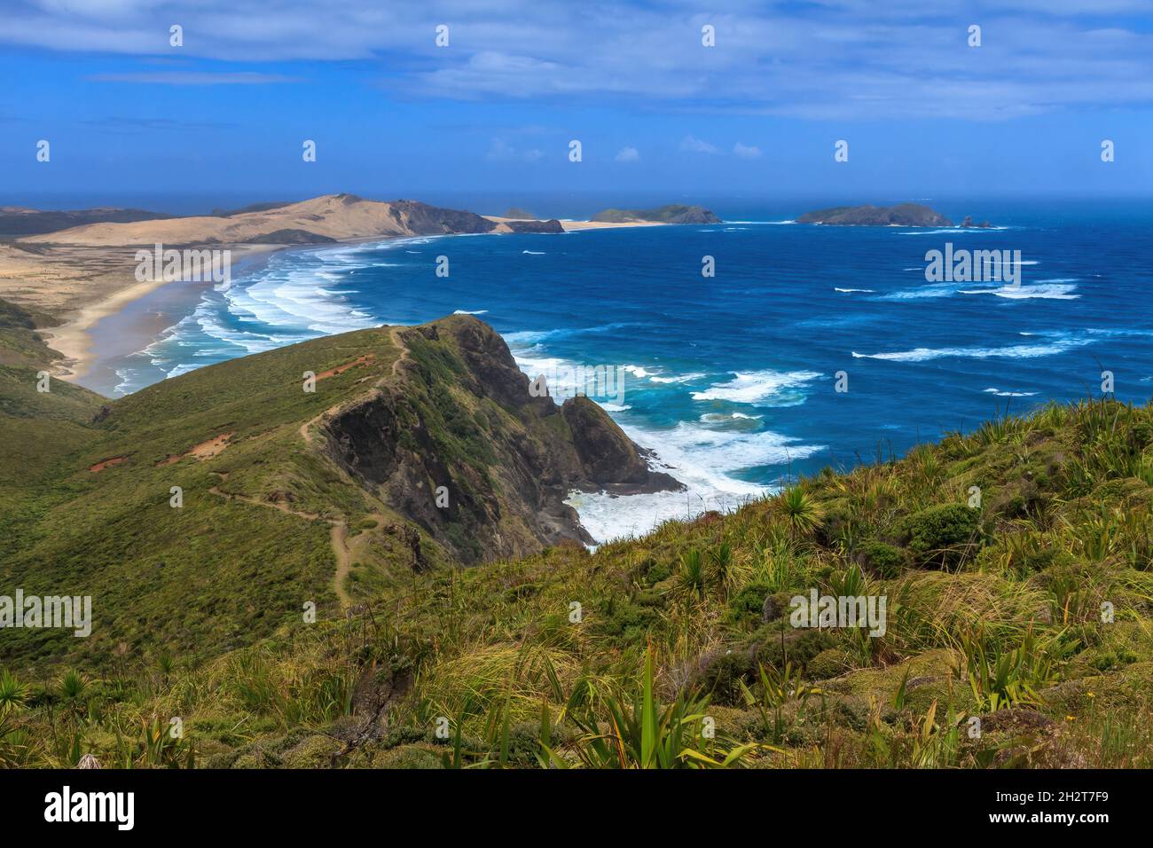 Rugged coastline at Cape Reinga, New Zealand, looking towards Te Werahi ...