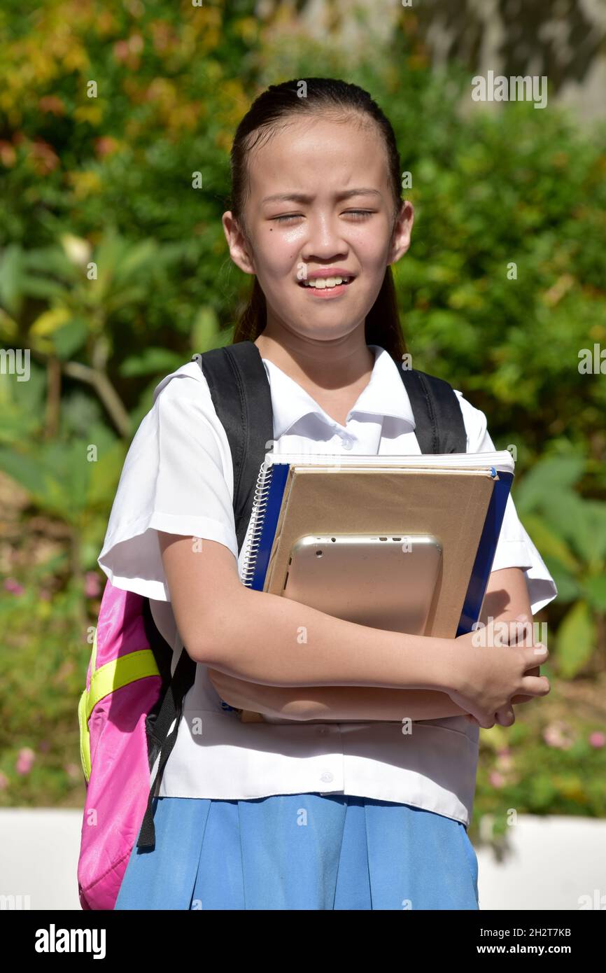 Minority Female Student With Eyes Closed Stock Photo - Alamy