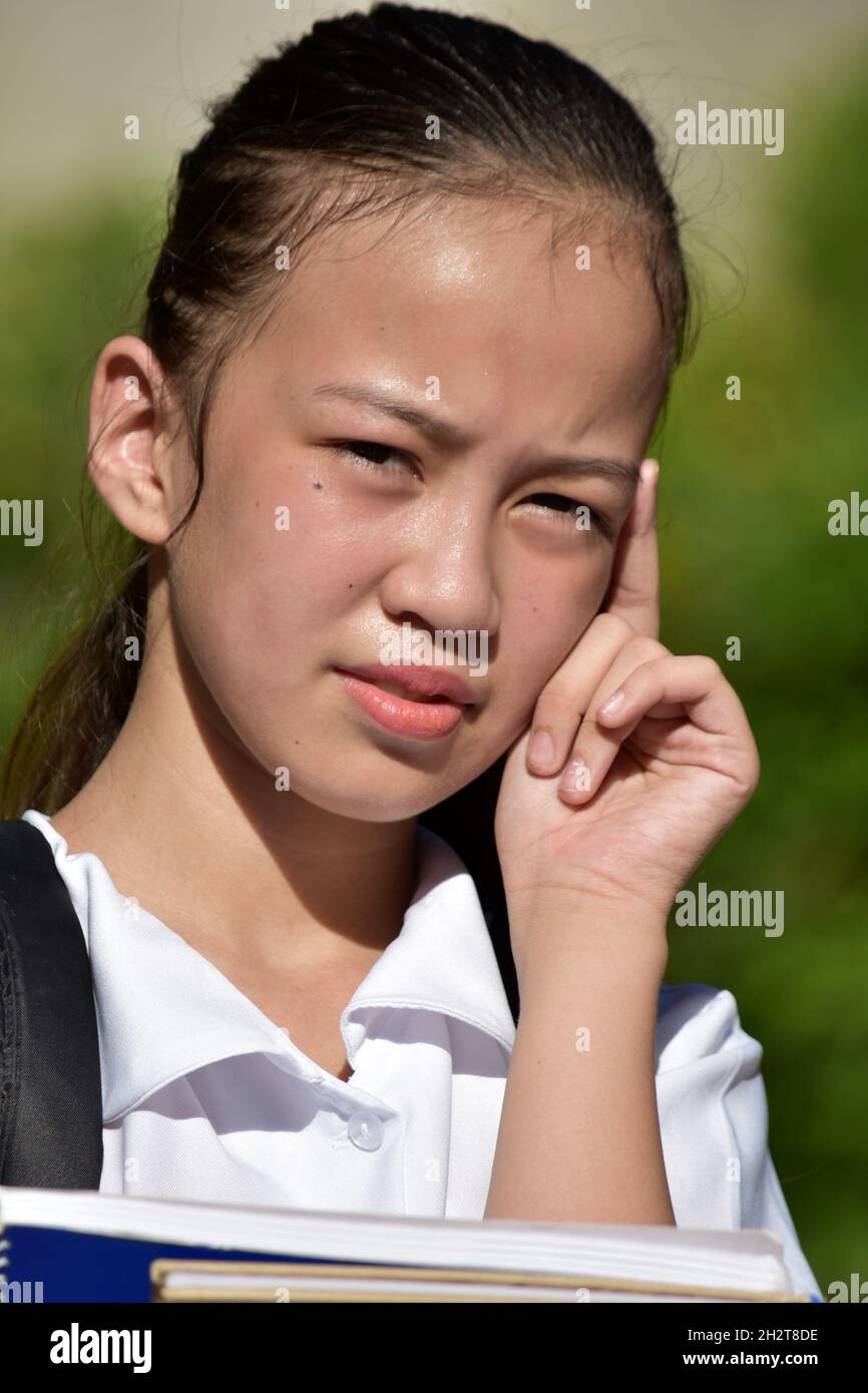 Girl thinking school hi-res stock photography and images - Alamy