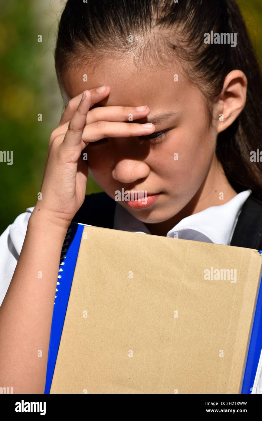 An Anxious Cute Girl Student Stock Photo - Alamy