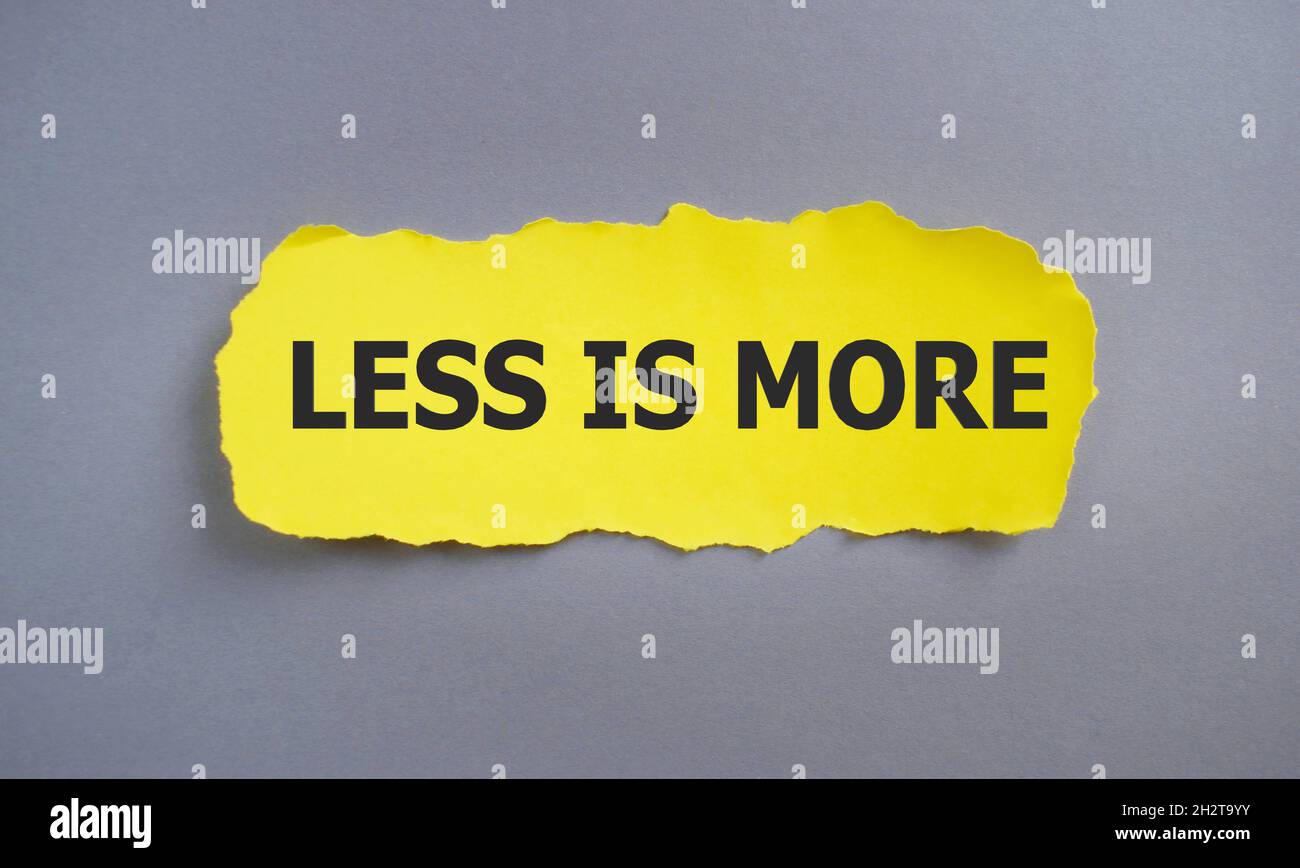 less is more - efficiency concept - isolated text written on on yellow ...