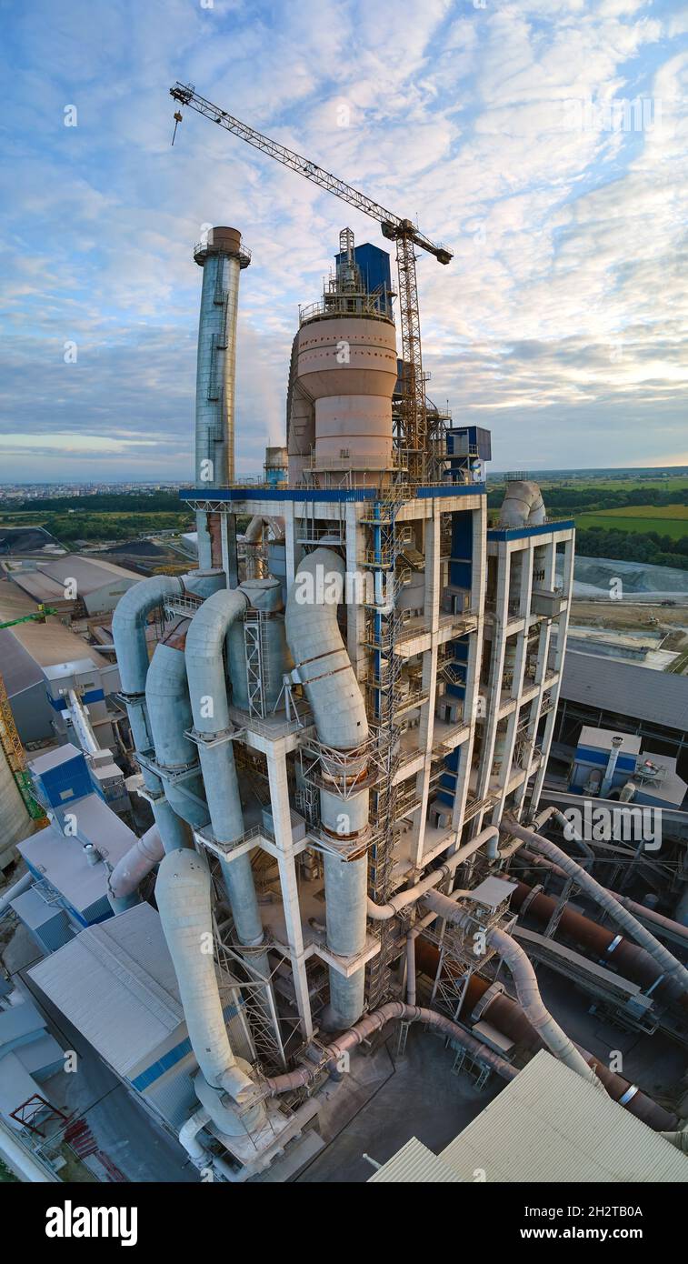 Aerial view of cement factory with high concrete plant structure and ...