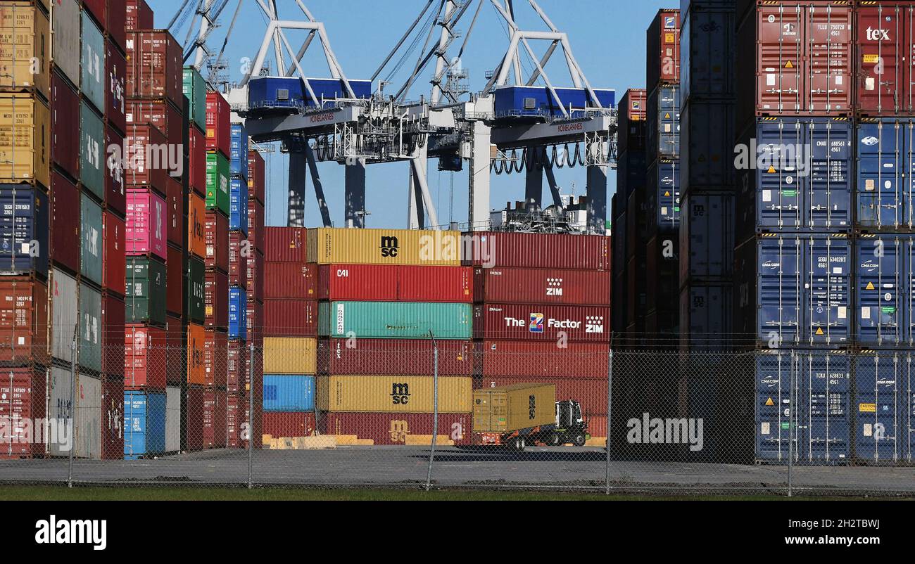 Savannah, United States. 23rd Oct, 2021. A truck carries a shipping ...