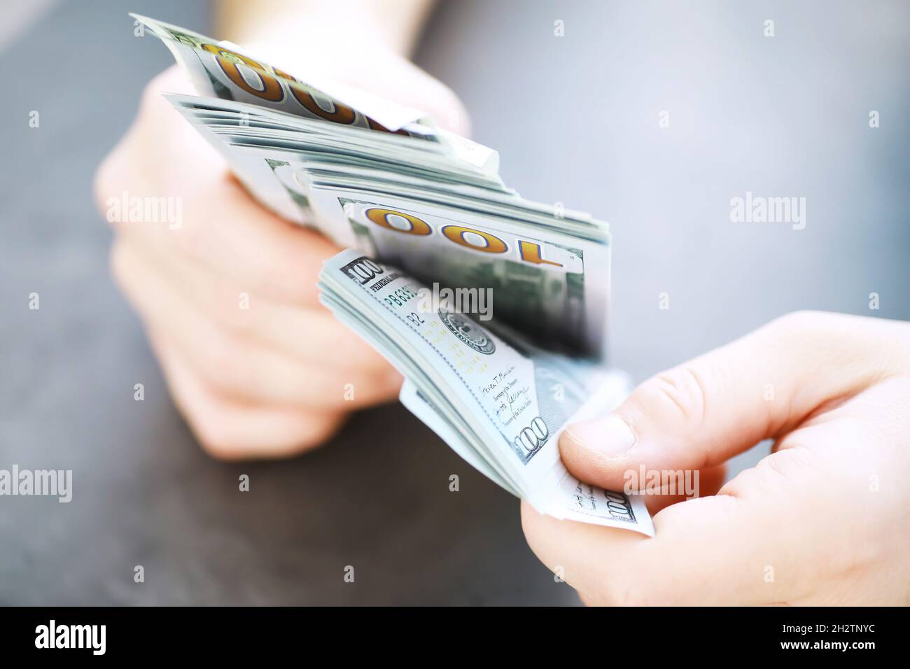 Cash money in a large pile as a finance background. Paper money close ...