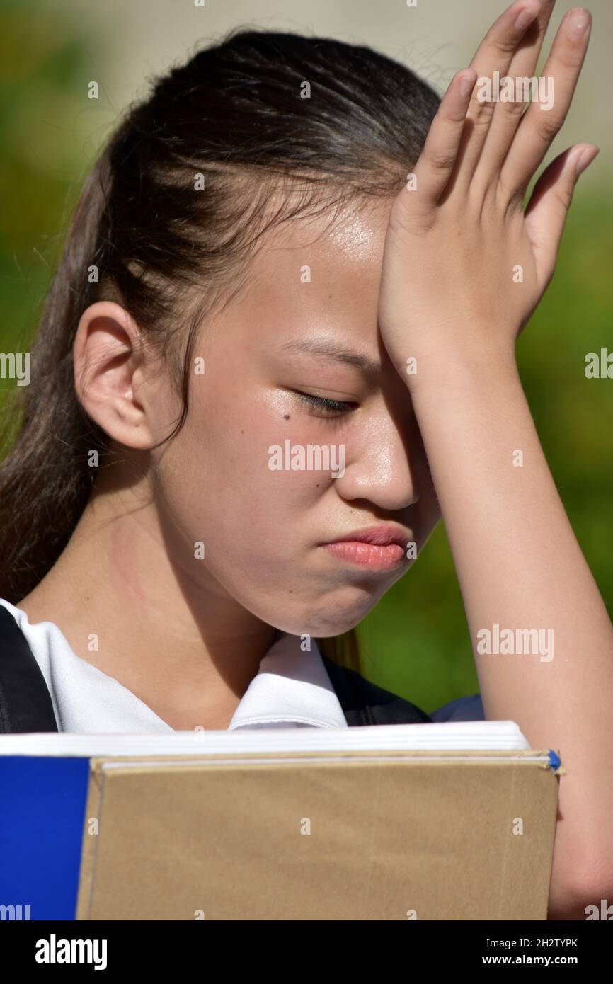 Youthful Diverse Girl Student Memory Problems Stock Photo - Alamy