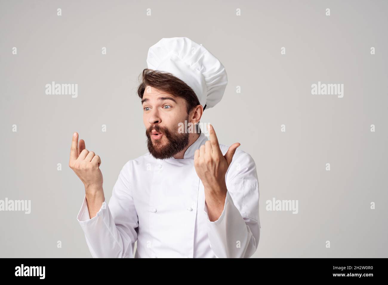 bearded man Chef uniform Cooking emotions gourmet posing studio Stock ...