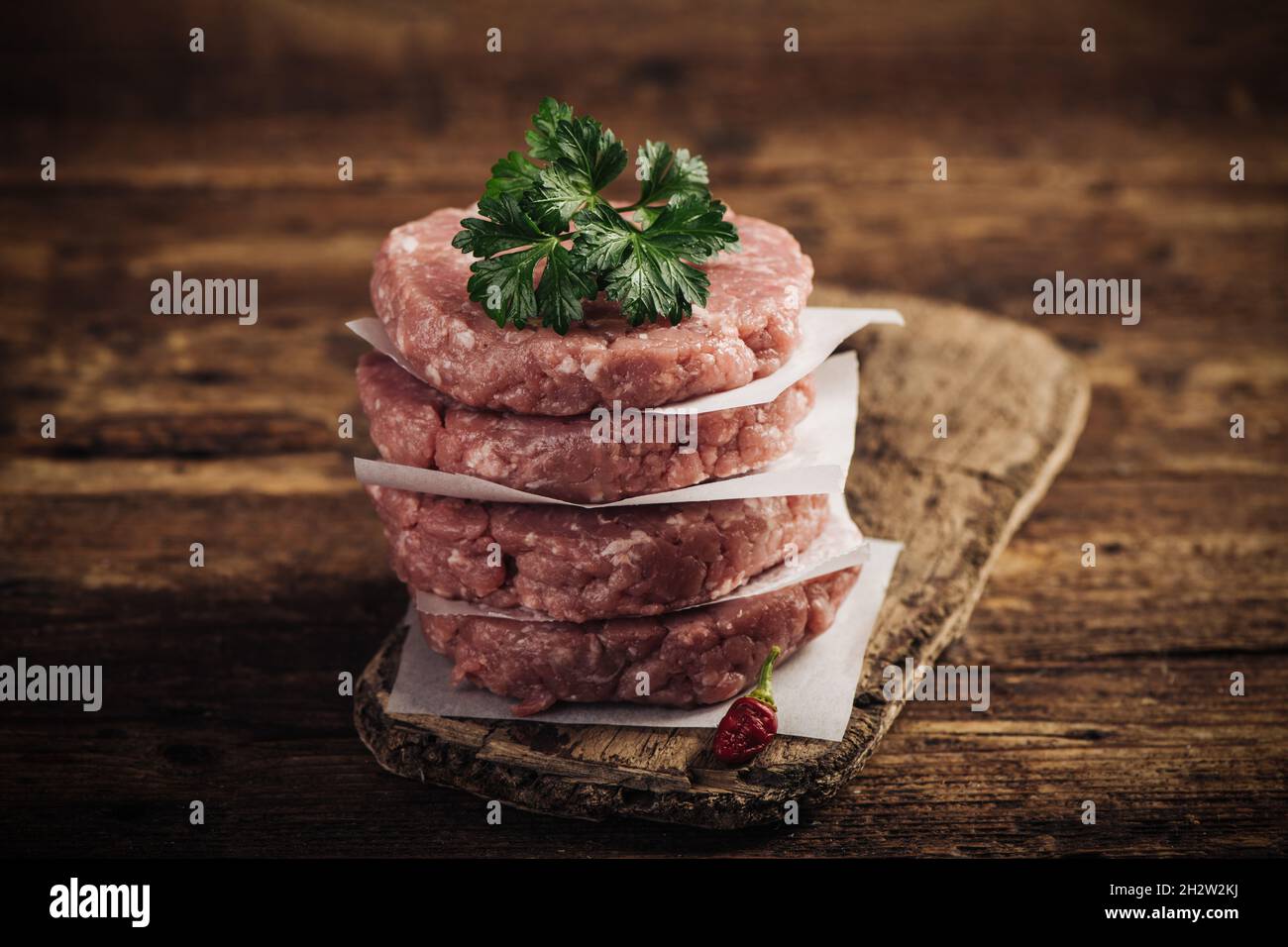 Raw ground beef meat burger steak close up Stock Photo - Alamy