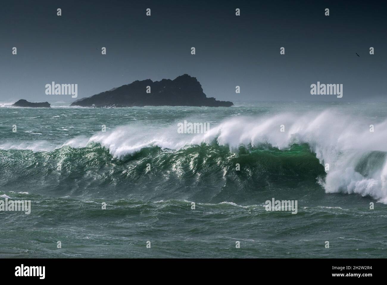 Wild waves breaking and choppy sea around The Goose Island off the ...