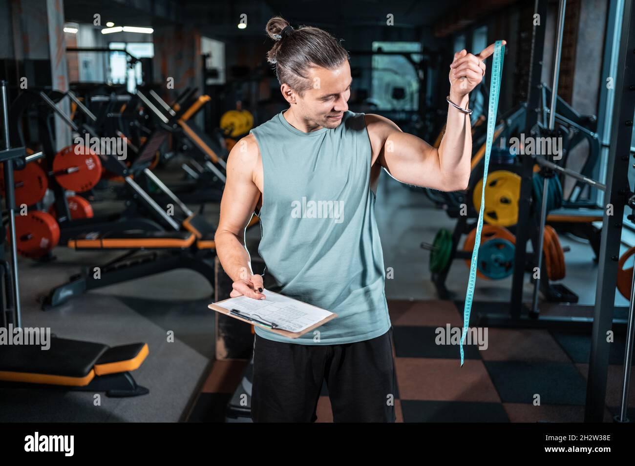 Man measuring waist tape measure hi-res stock photography and images ...