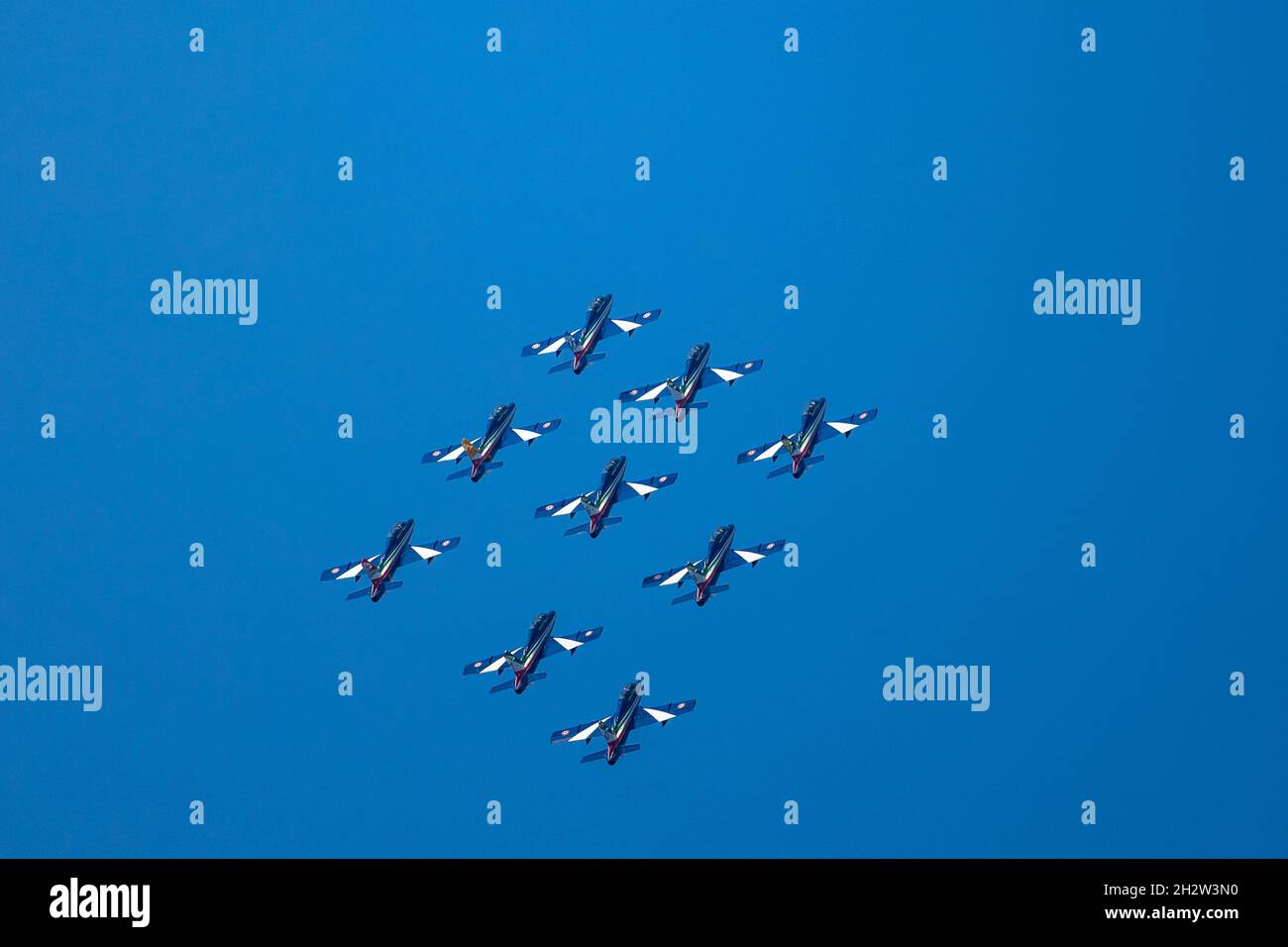 An Aerobatic Aviation Group of squadrons in the sky Stock Photo - Alamy