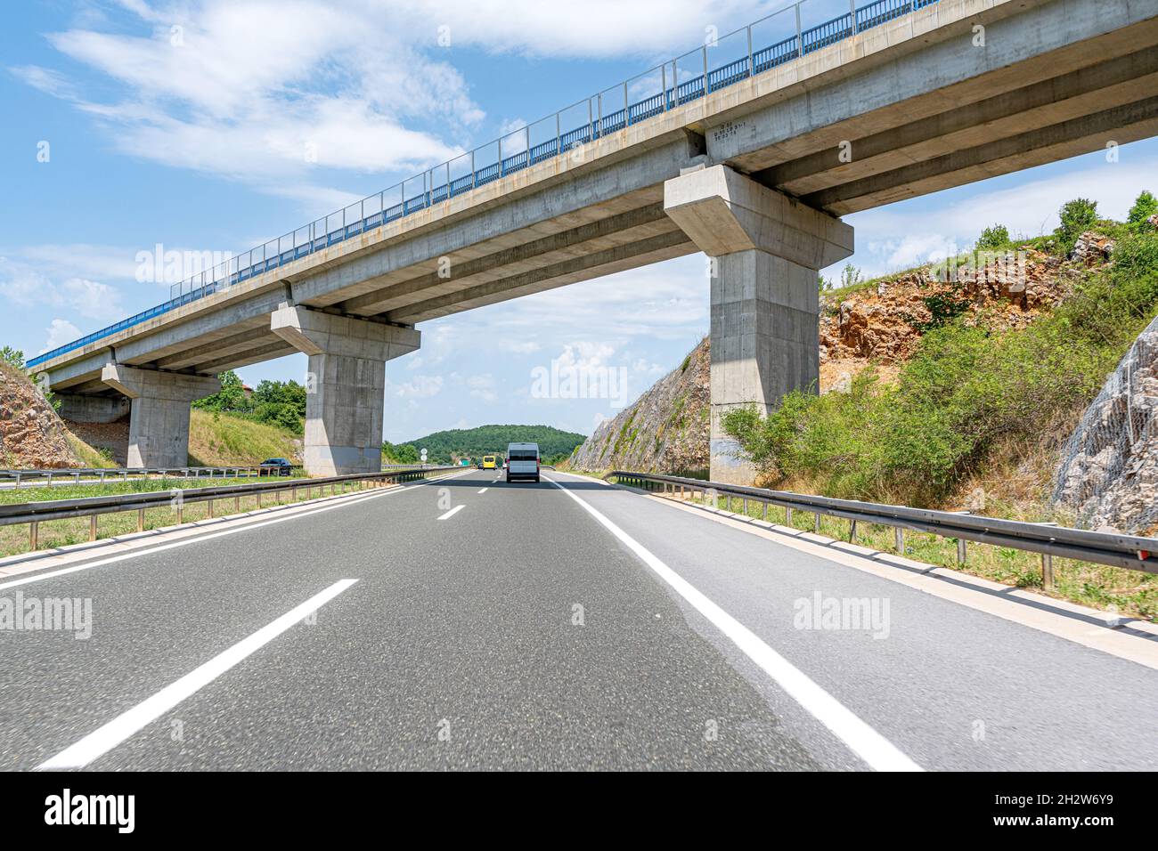 Highway bridge and cars on the road Stock Photo - Alamy