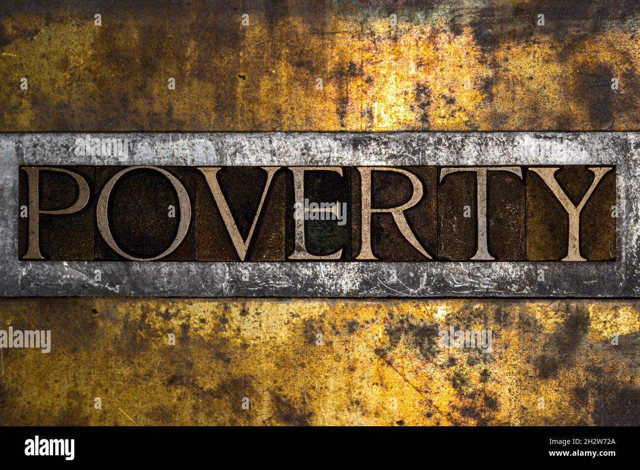 Poverty text message on textured grunge copper and vintage gold ...
