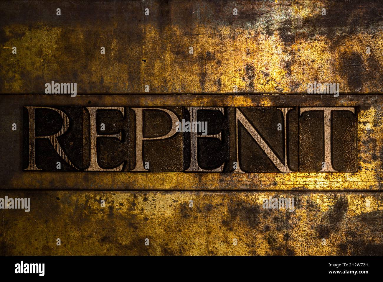 Repent text message on textured grunge copper and vintage gold ...
