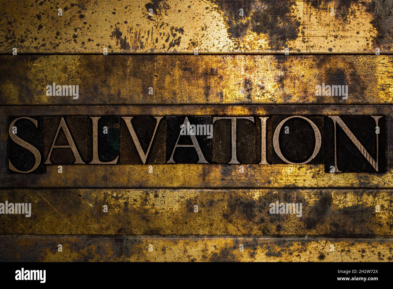 Salvation text message on textured grunge copper and vintage gold ...