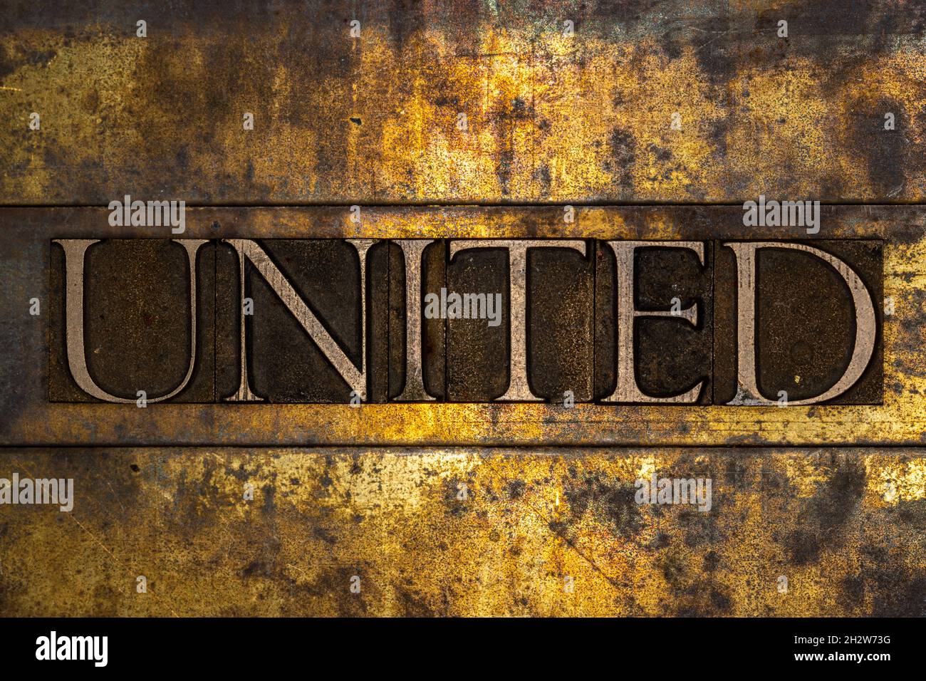 United text message on textured grunge copper and vintage gold ...
