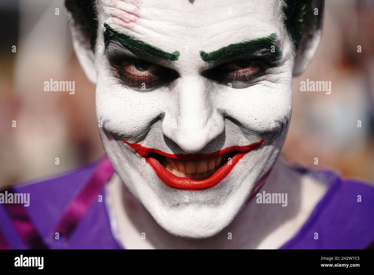 A cosplayers dressed as the Joker during the third day of MCM Comic Con ...