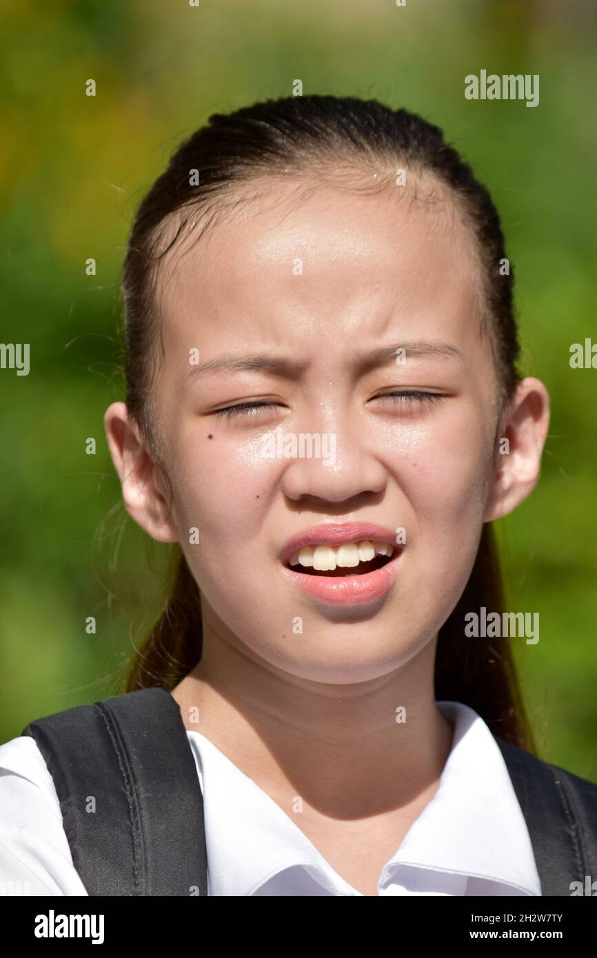 Beautiful Minority Female Student With Eyes Closed Stock Photo - Alamy
