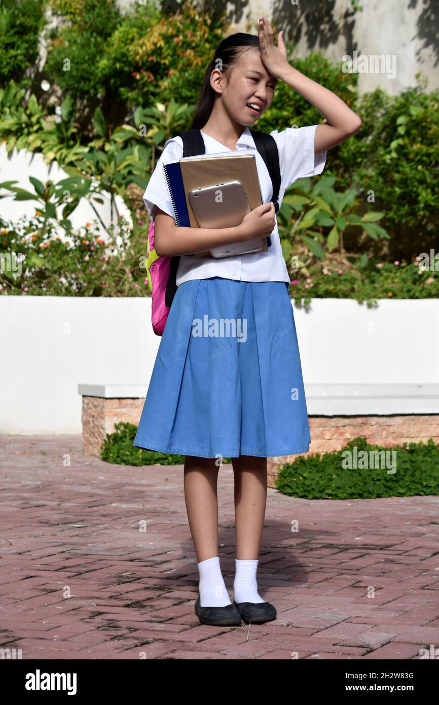 Female Student And Memory Loss Wearing Backpack Standing Stock Photo ...