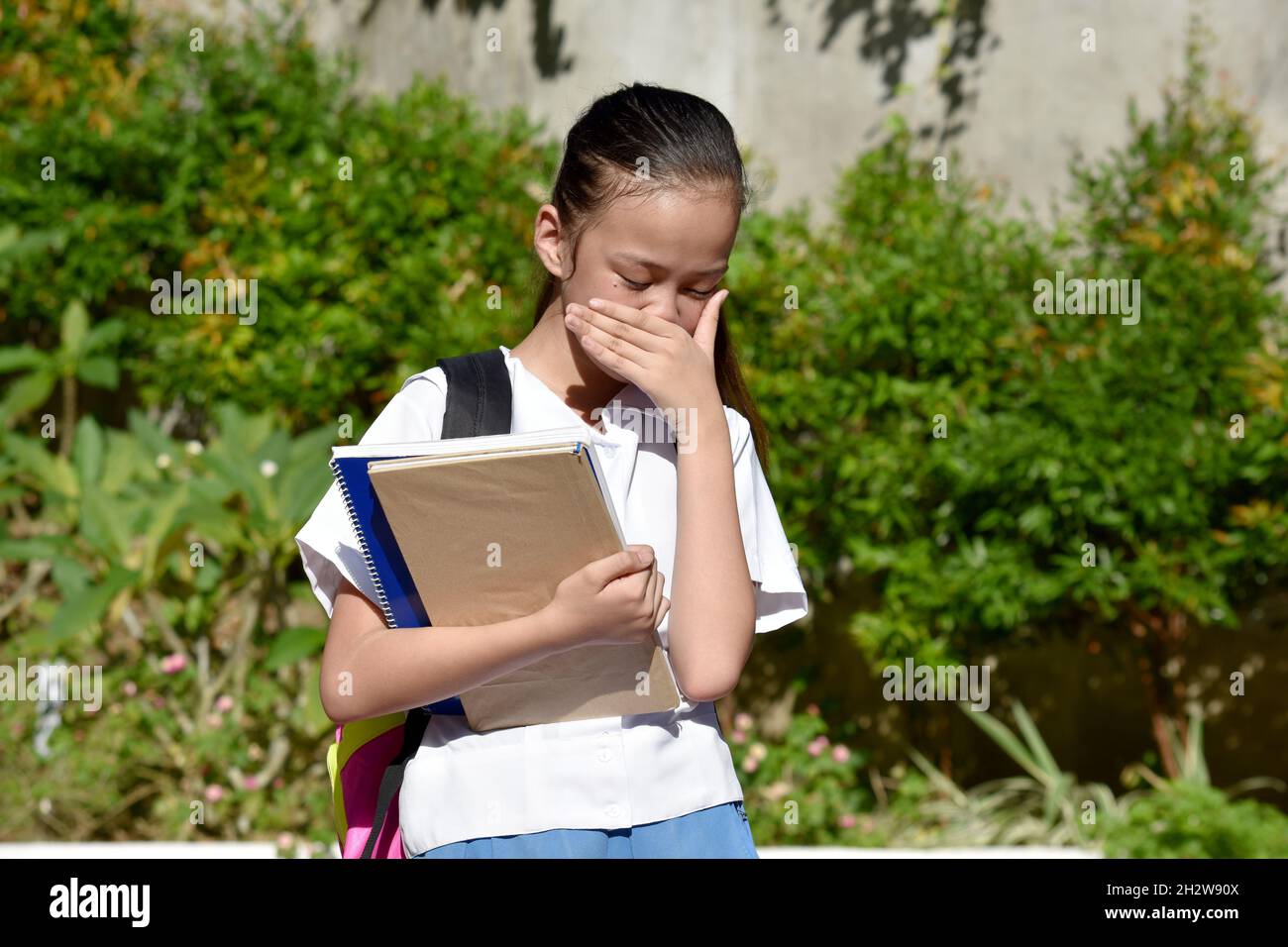 Beautiful Girl Student Crying With School Books Stock Photo - Alamy