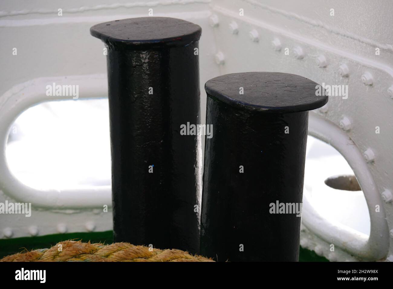 black metal bollards as a holding post for ship rope on a ship Stock ...