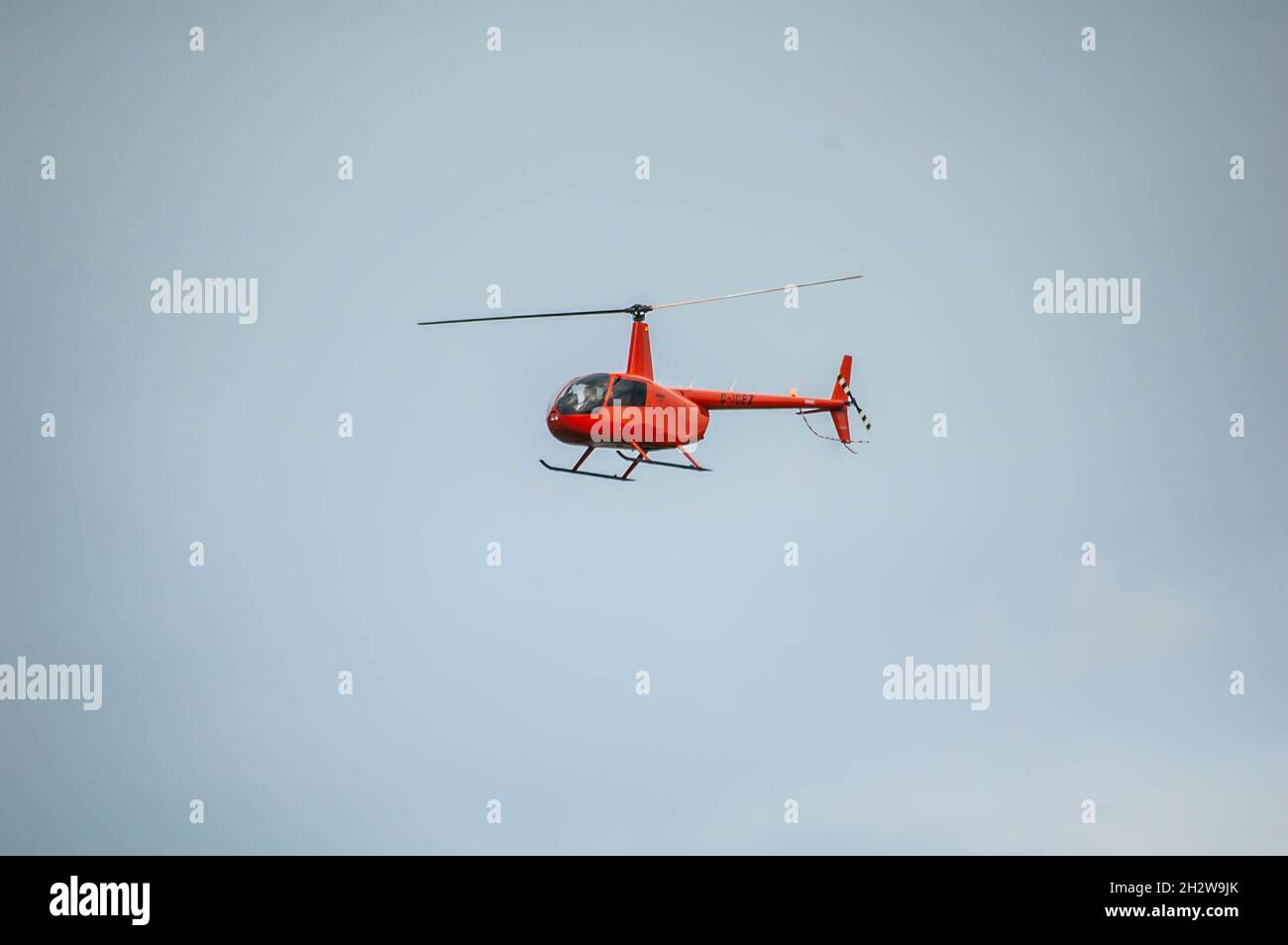 ELSTREE, LONDON, ENGLAND- 17 October 2021: Robinson R44 Cadet ...