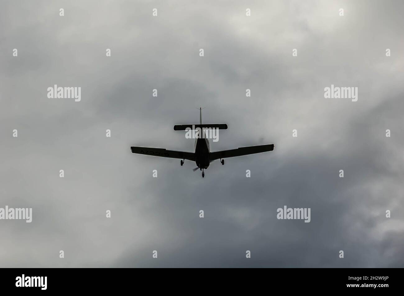 Small single engine piston aircraft in the sky after taking off from an ...