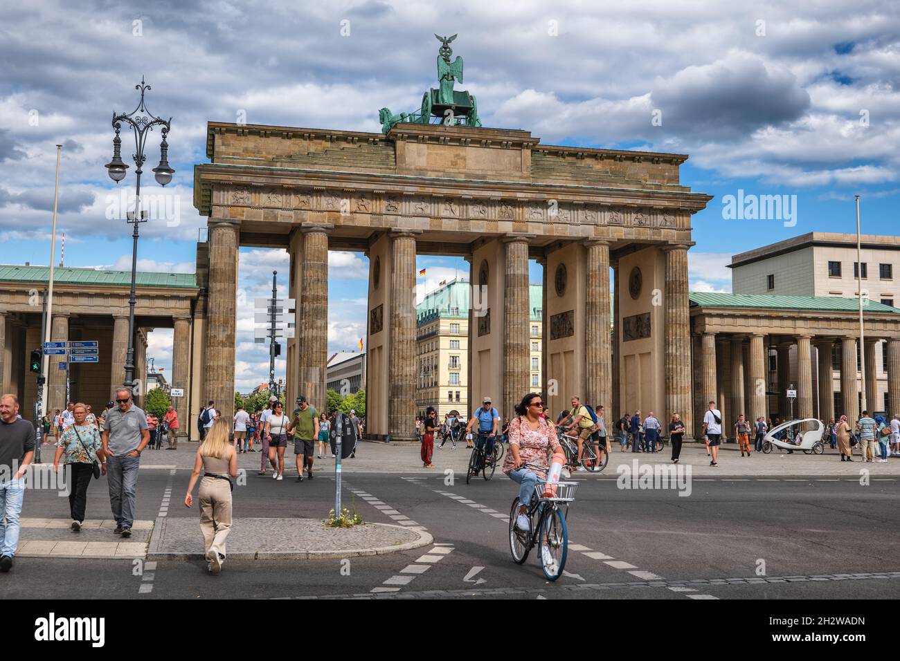 People at the Brandenburg Gate (Brandenburger Tor) in city of Berlin ...
