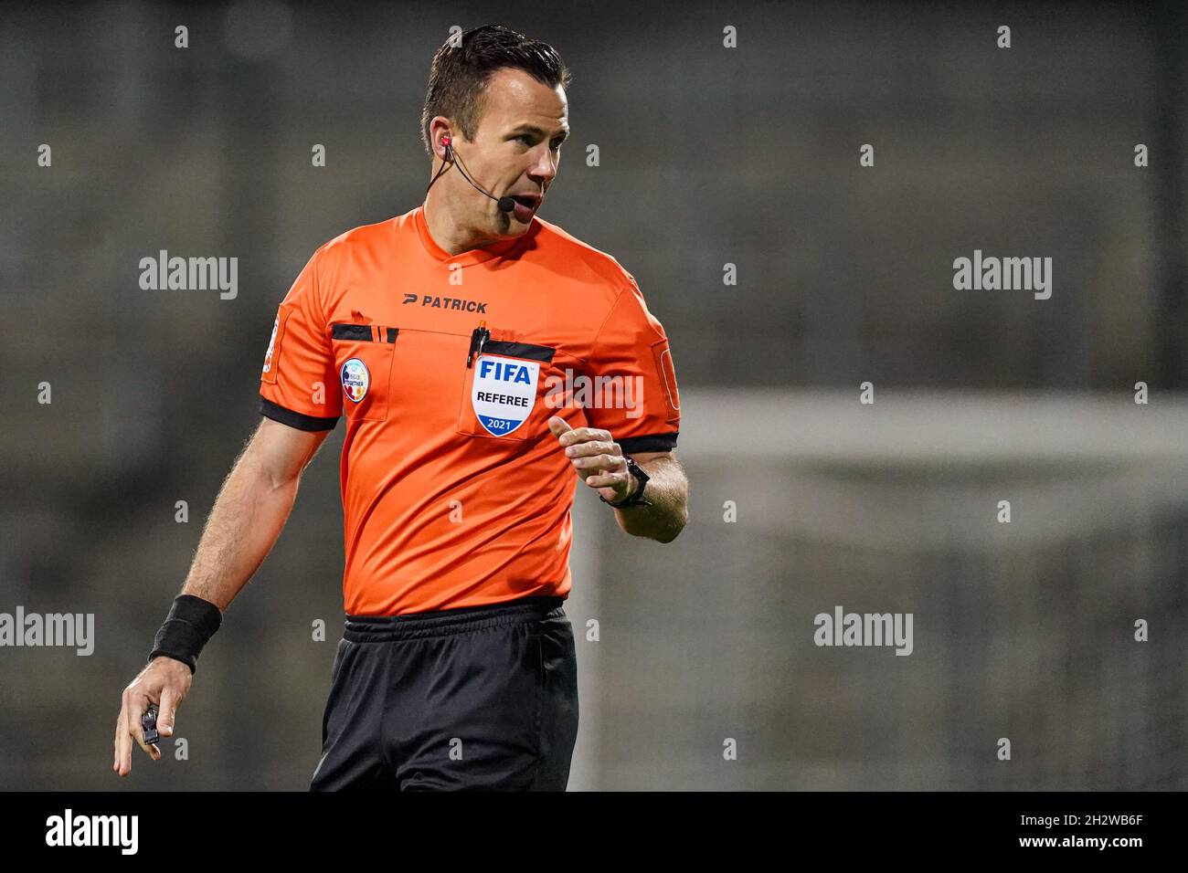 EUPEN, BELGIUM - OCTOBER 23: referee Bram Van Driessche looks on during ...