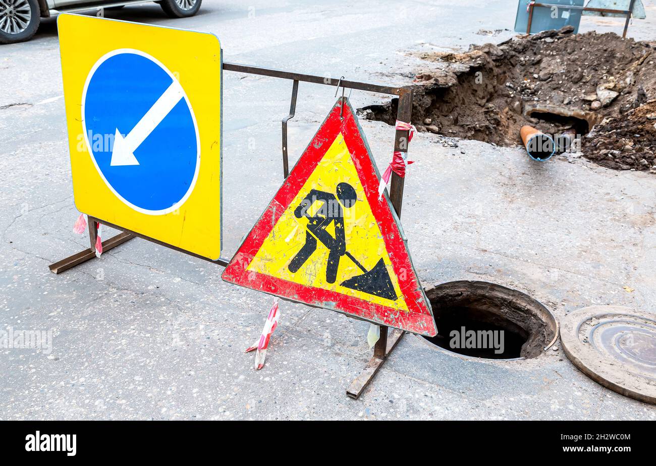 Road works traffic sign at the city street. Under construction road ...