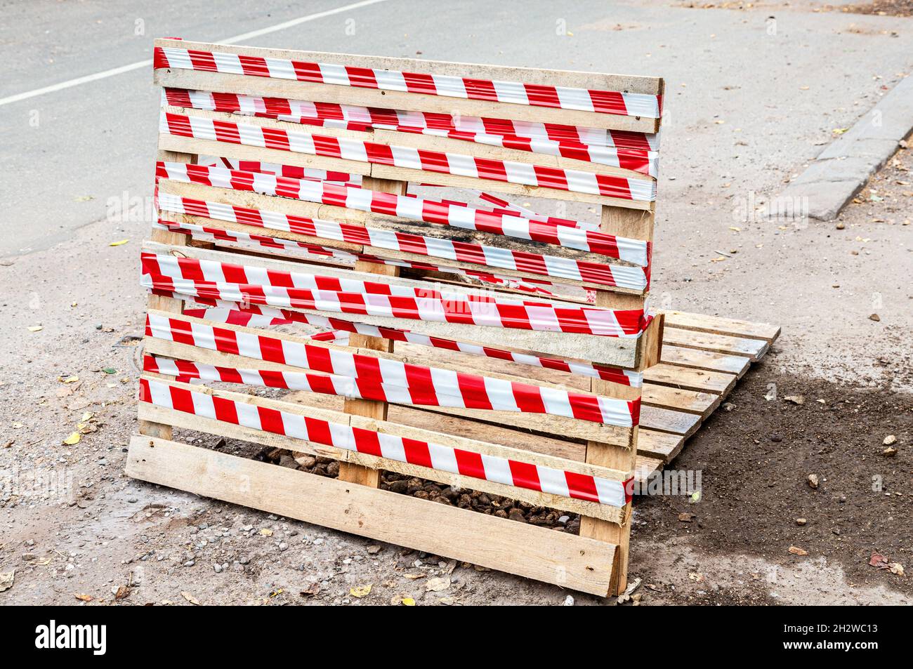 Handmade stop road sign on the road close up. Road works traffic sign ...