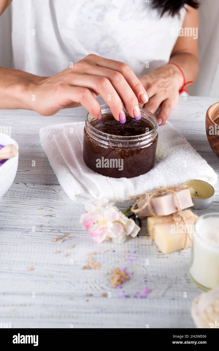 Woman hands receiving a hand scrub peeling Stock Photo - Alamy