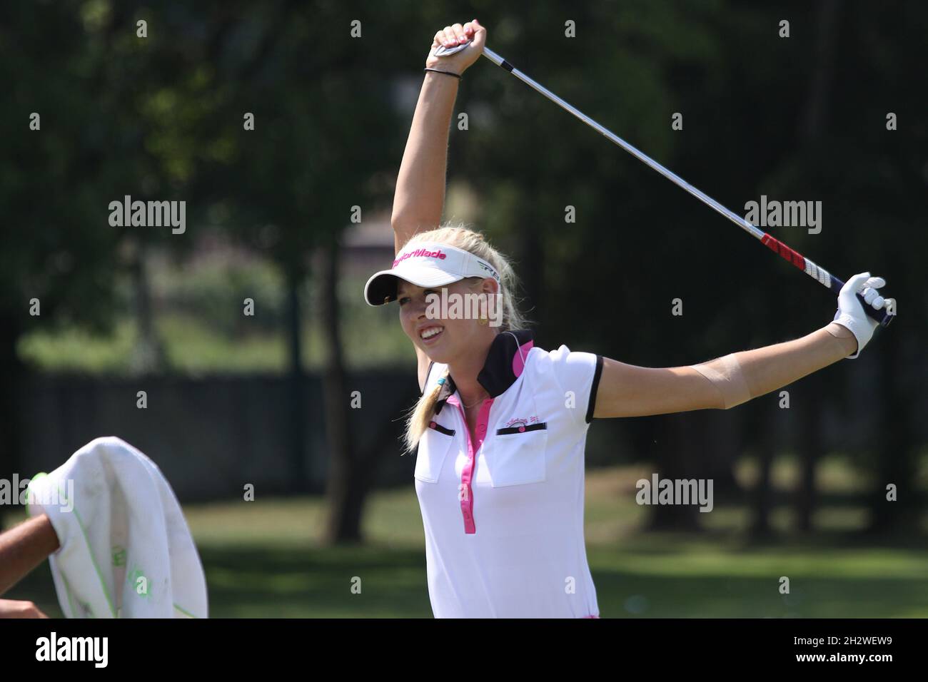 lady golfer in action on a golf course,in Evian, france Stock Photo - Alamy