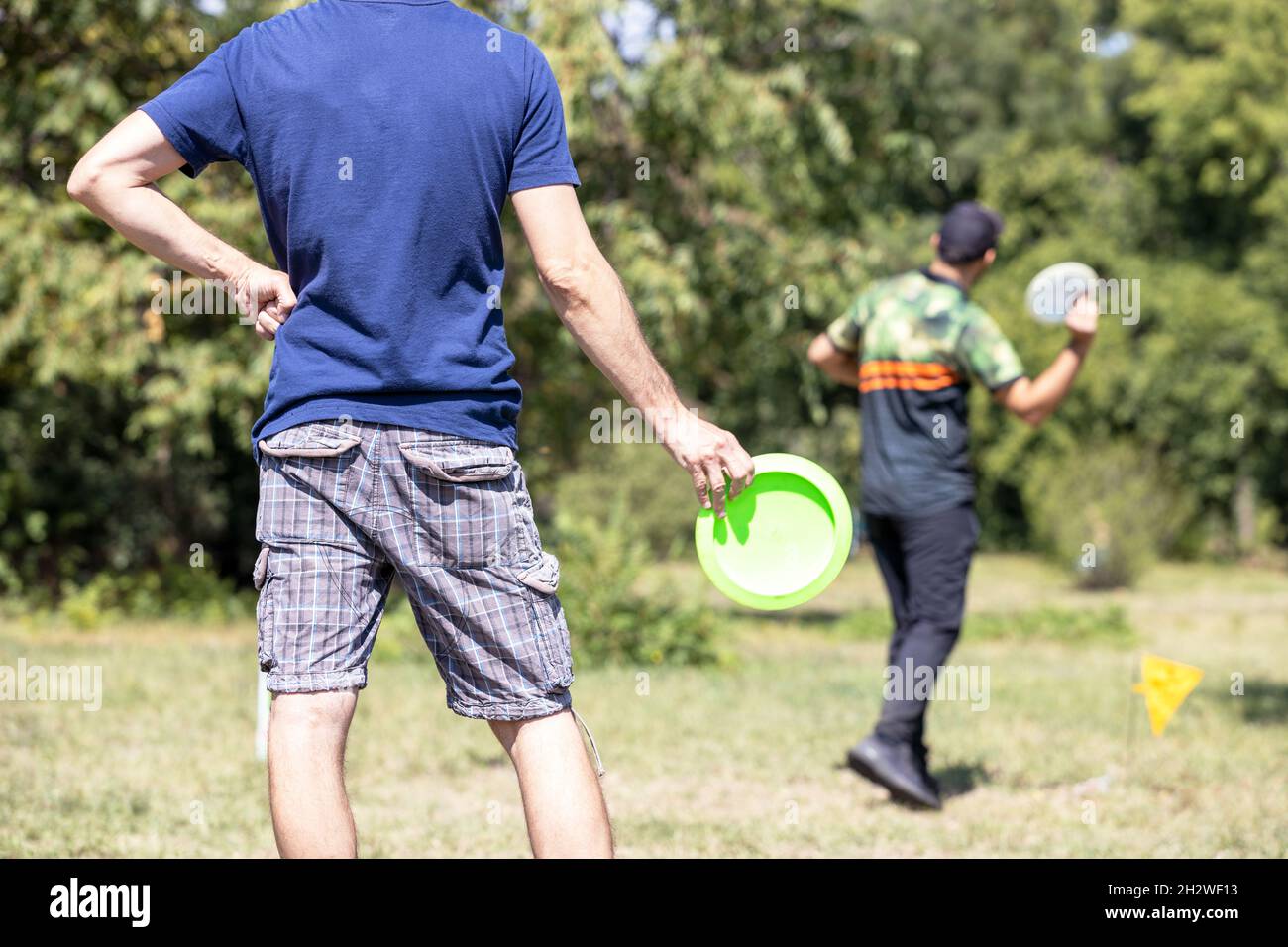 Flying disc sport game in the nature Stock Photo - Alamy