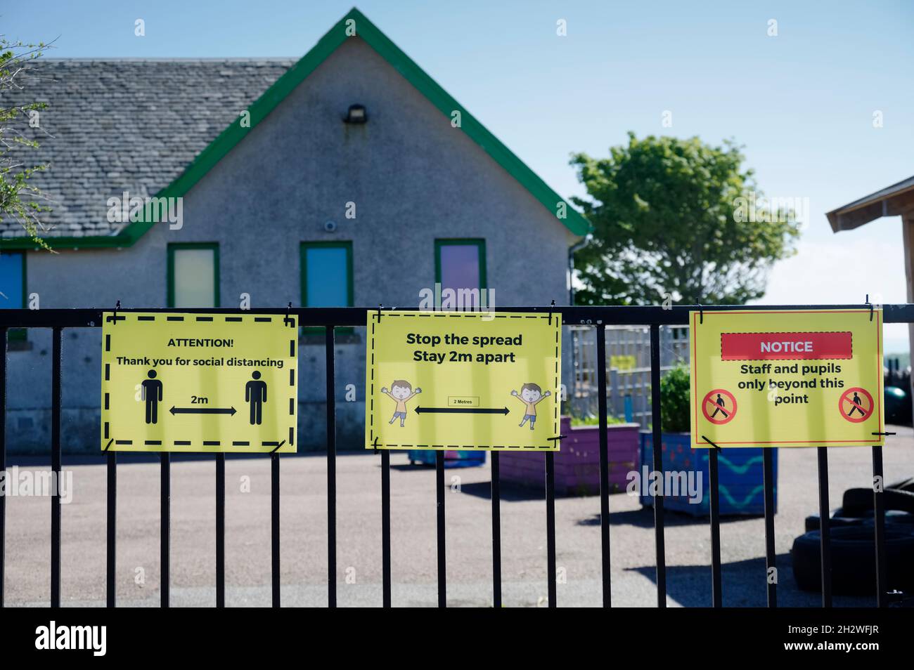Social distancing sign at school playground road crossing Stock Photo ...