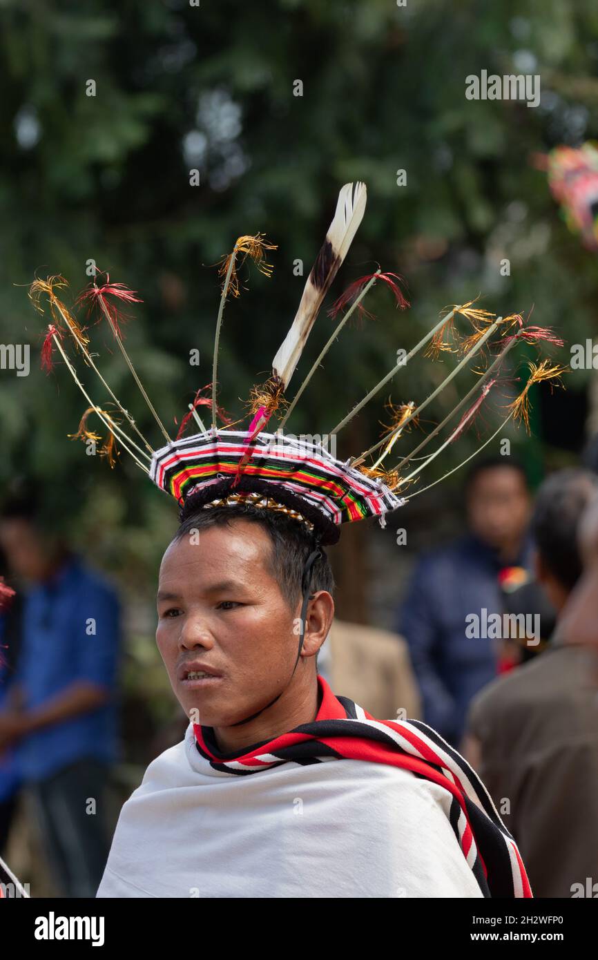 Portrait of a Naga tribes man dressed in traditional attire at Kohima ...